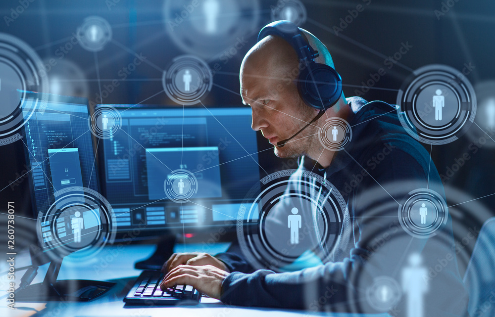 cybercrime, hacking and technology concept - male hacker in headset with progress loading bar on ...