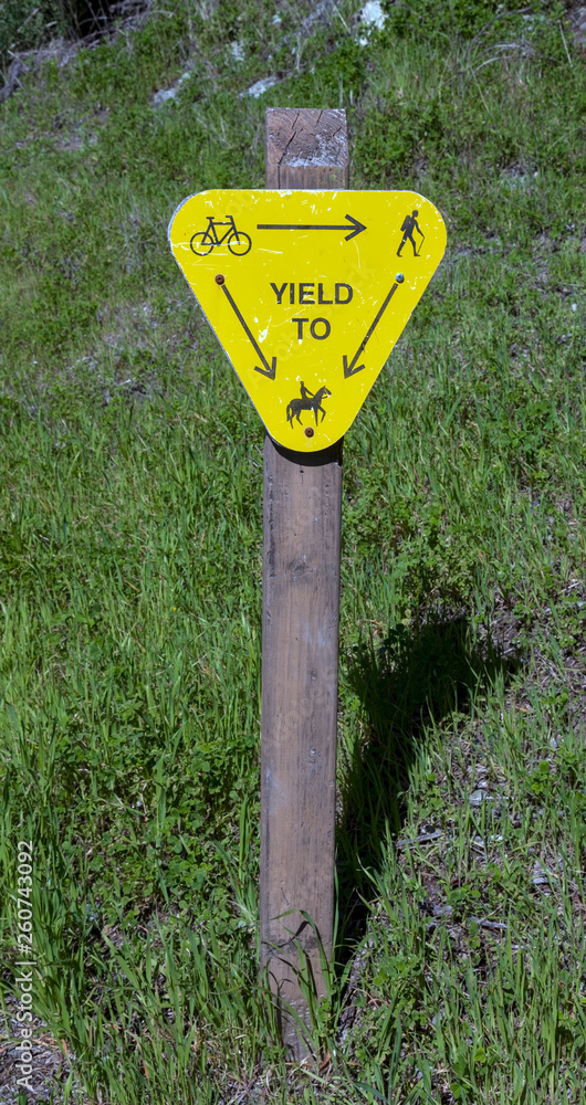Basic park courtesy sign requesting hikers, bicyclists and equestrians ...