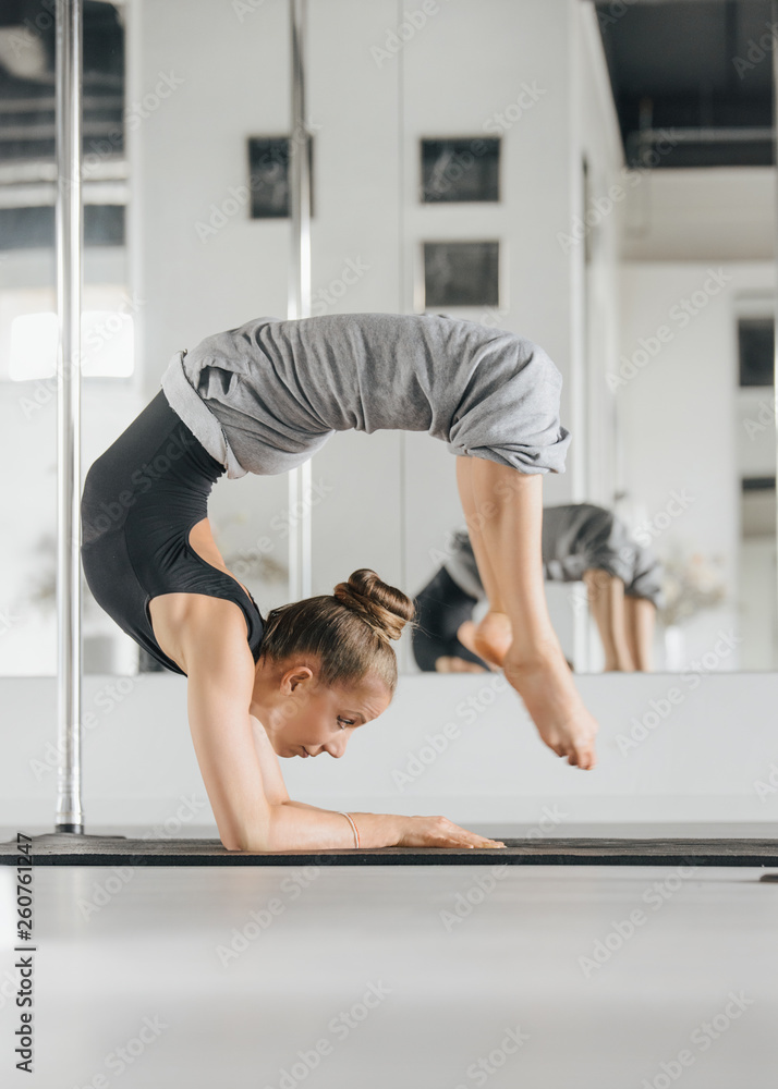 Professional flexible gymnast showing her flexibility skills Stock ...