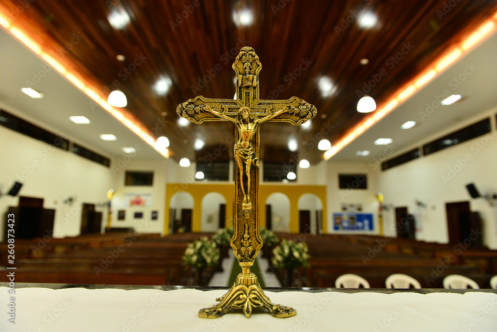 golden crucifix on the church altar, empty church, golden cross, metal ...