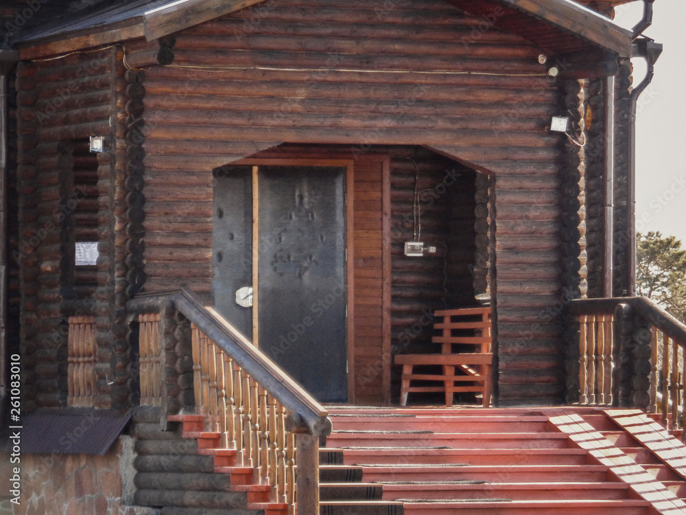 Christian wooden temple closeup. Entrance to the Christian church ...