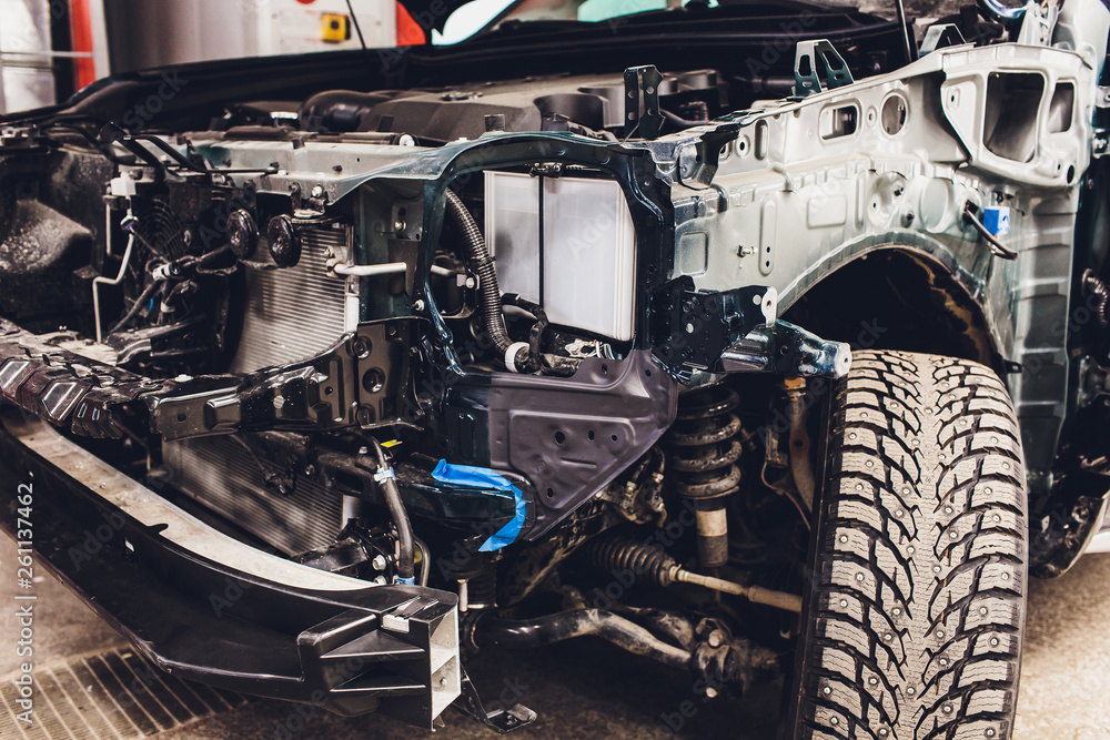 wires from the car wiring lies in the cabin of the dismantled car with ...