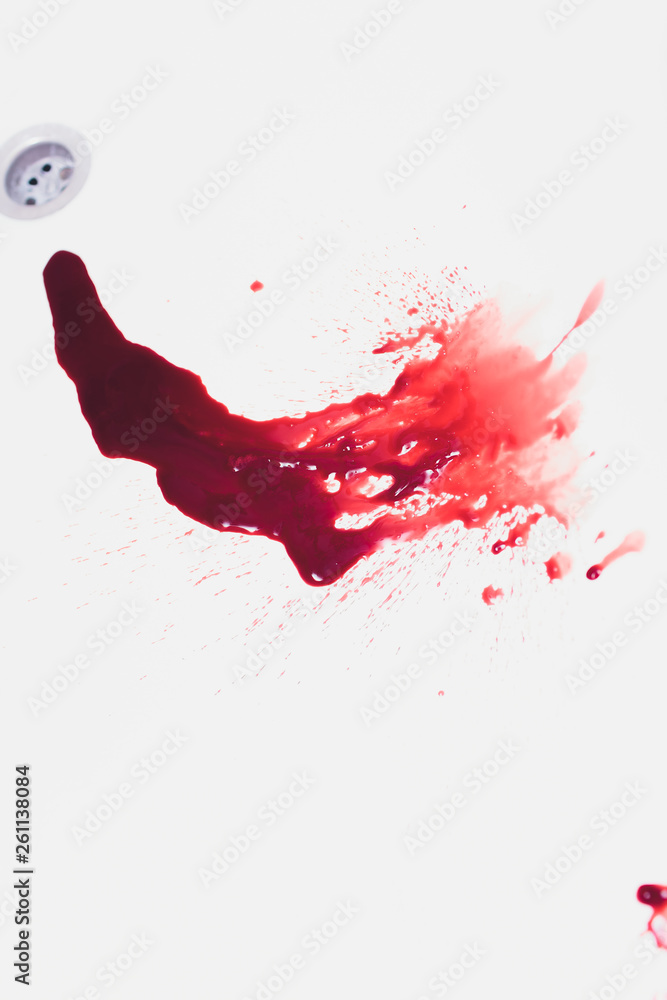Blood draining from white bathroom basin. Bloody stains in the ...