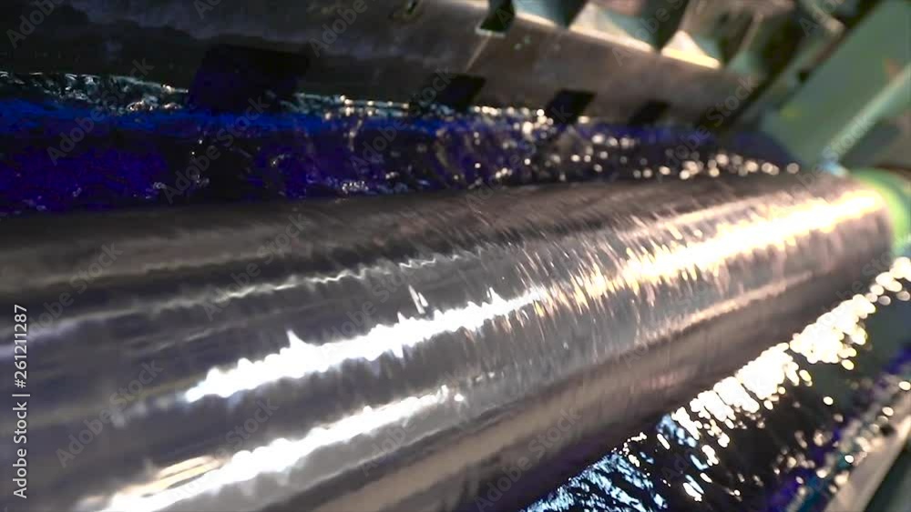 The mechanism of printing on wallpaper. Modern digital printing press ...