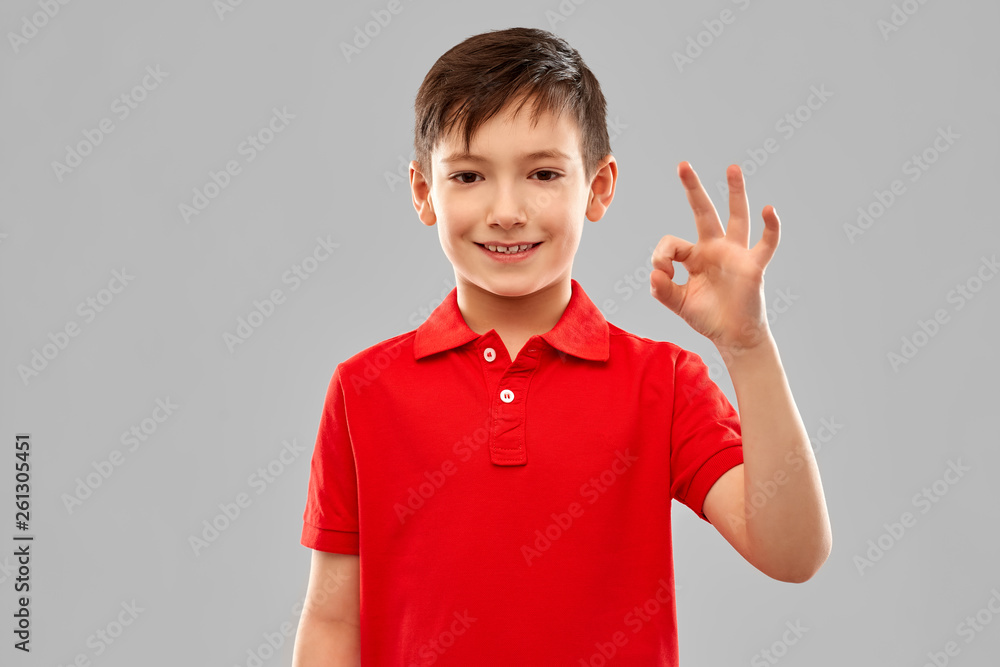 childhood, gesture and people concept - portrait of smiling little boy ...