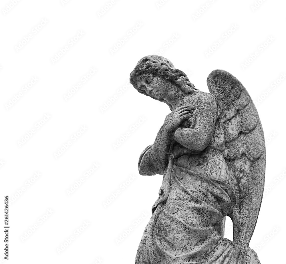old stone statue of sad angel. stone memorial grieving angel statue on ...