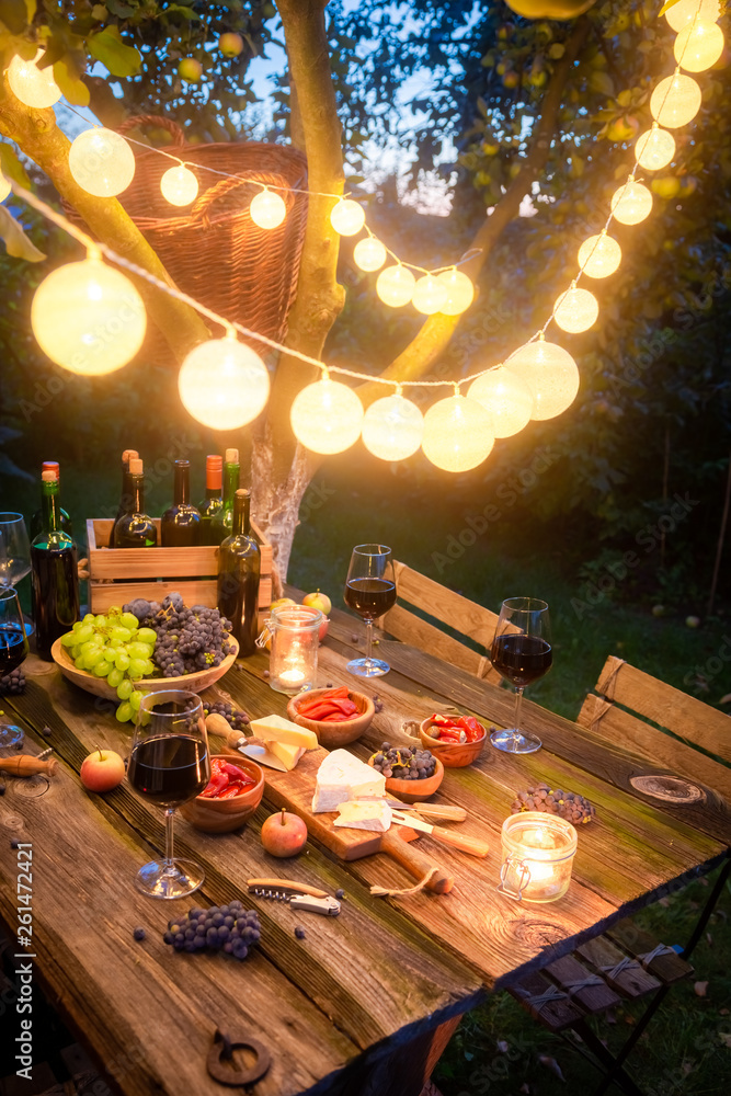 Preparation for supper with wine and fruits in the evening Stock Photo ...