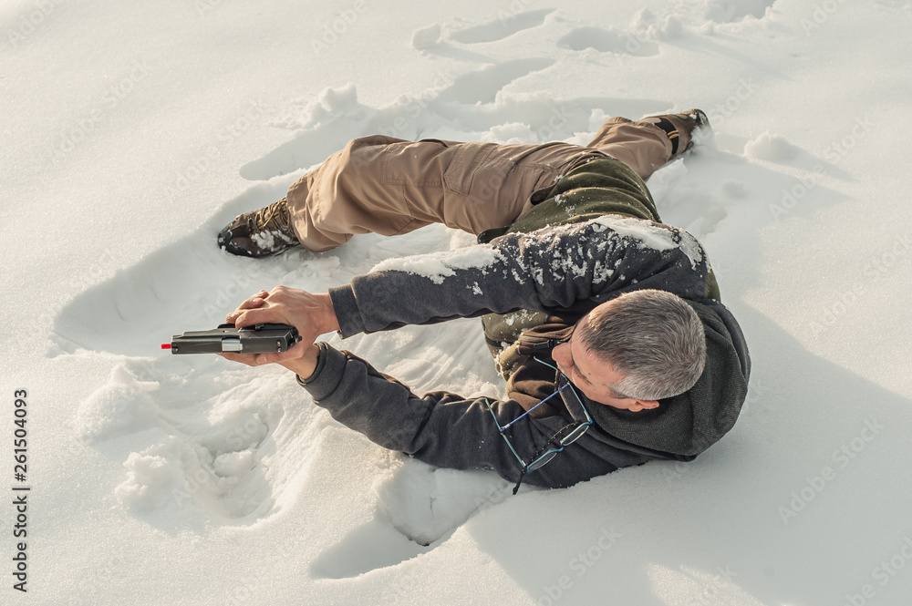 Instructor demonstrate body position of gun shooting on shooting range ...