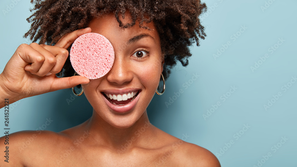 Pure skin and beauty concept. Glad positive woman with crisp hair ...