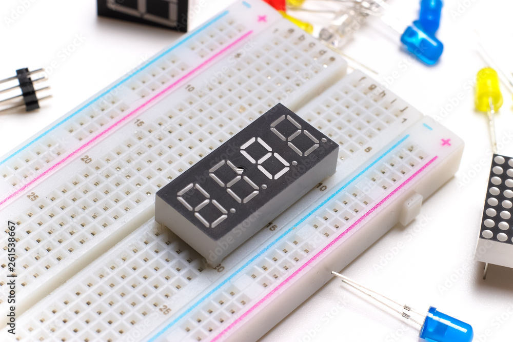 Breadboard close-up, seven segment indicators and color led lamp. Stock ...