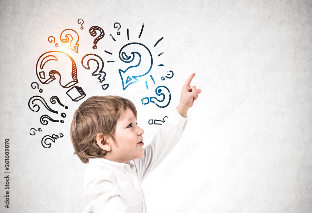 Little boy and question marks Stock Photo | Adobe Stock