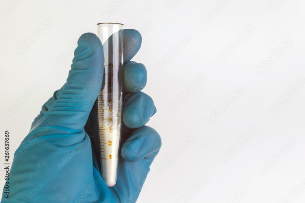 detection of cocaine and heroin: a medical laboratory worker holds in ...