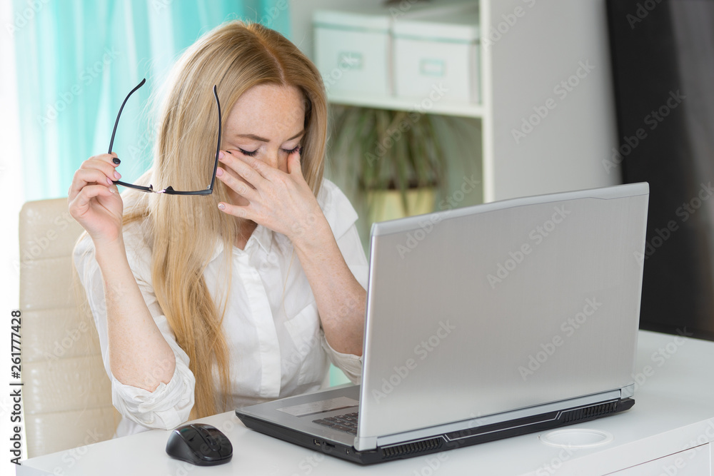 Tired young woman student feeling eye strain bad blurry vision rubbing ...