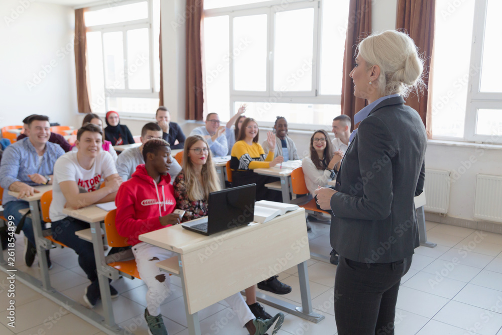 Female attractive professor explain lesson to students and interact ...