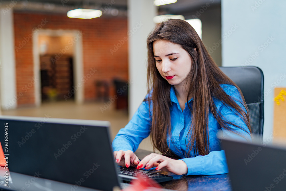Professional young woman computer engineer using code language ...