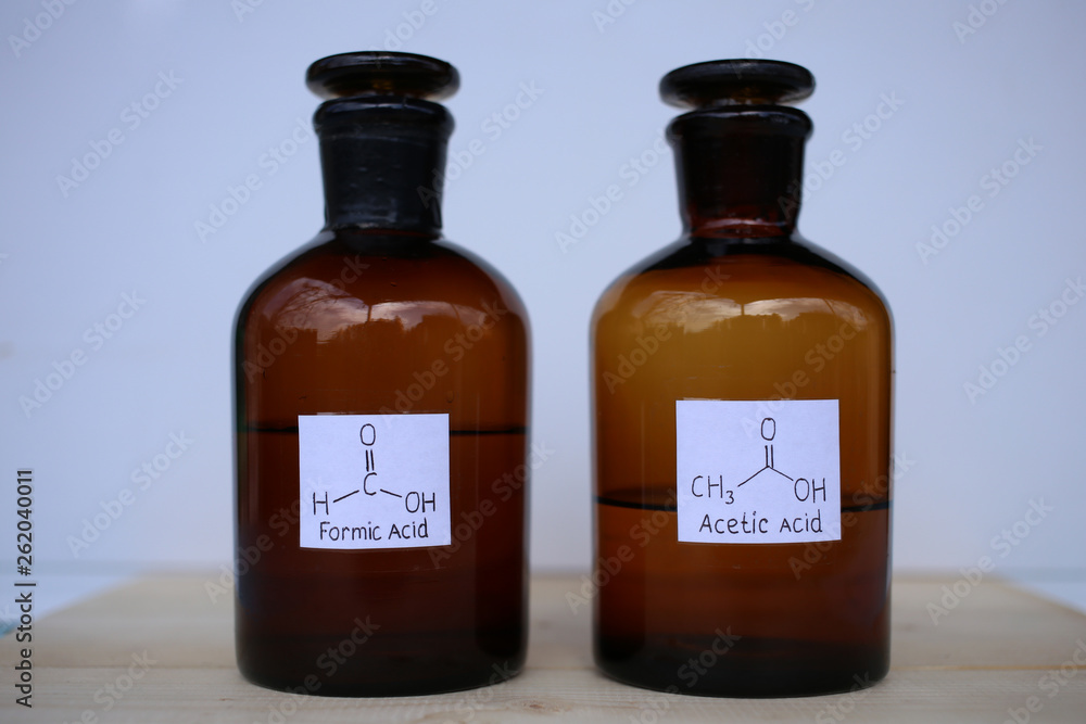 Formic and acetic acids in dark glass bottles. Substances are widely ...
