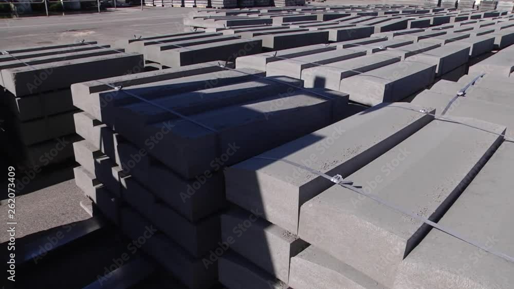 Unloading road curb to the warehouse. Technology and production of road ...