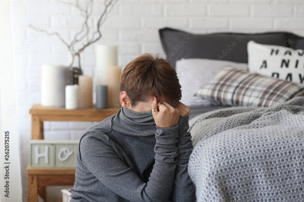 sad girl sitting bed bedroom rustic style Stock Photo | Adobe Stock