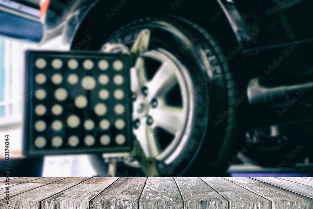 Empty Wooden Table with Blurred Automobile Repair Shop Background for ...
