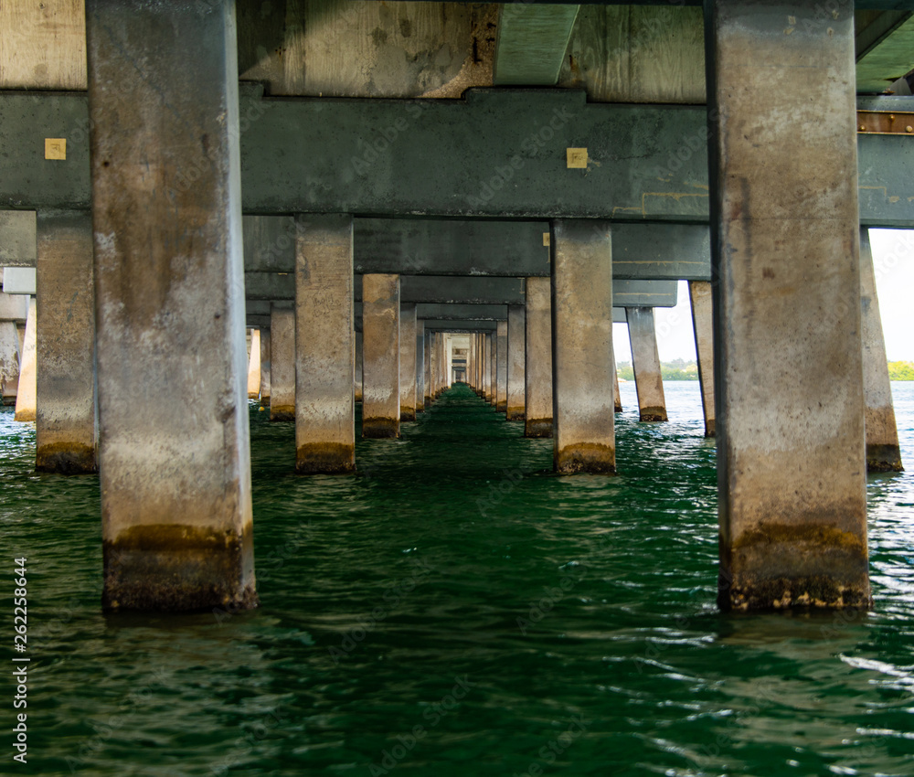 Waterlevel shot of the underside Boca Chica Bridge as it enters Stock ...