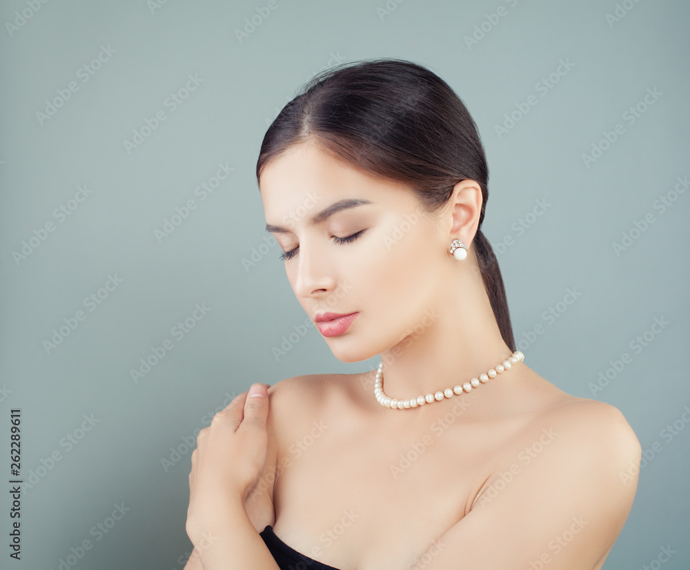 Beautiful woman with clear skin portrait. Elegant model in pearls Stock ...