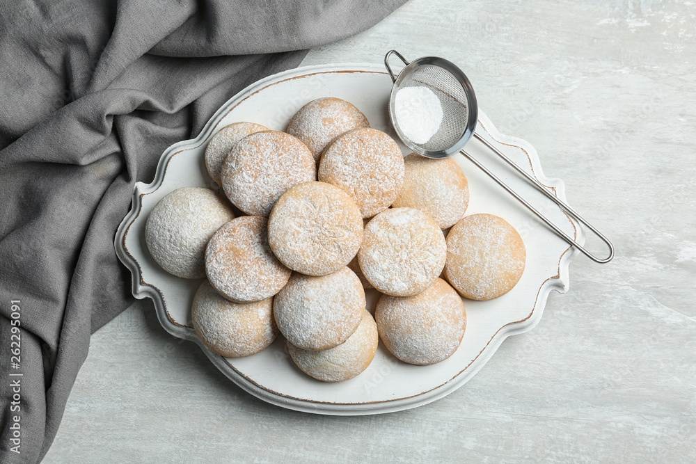 Traditional cookies for Islamic holidays and strainer with powdered ...