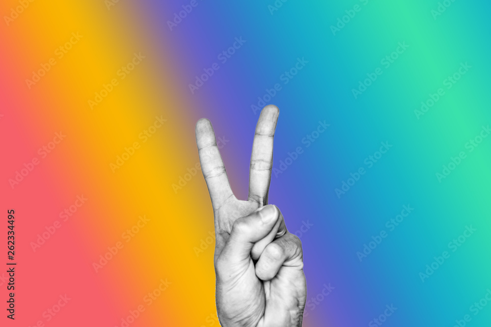 Concept of peace, pacifism, hippie, love. Hand making the two fingers ...