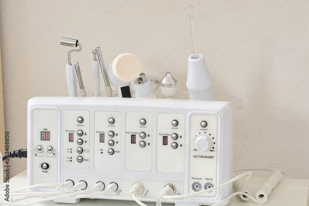 Cosmetic Multifunctional Device close-up in beauty salon. Ultrasound ...