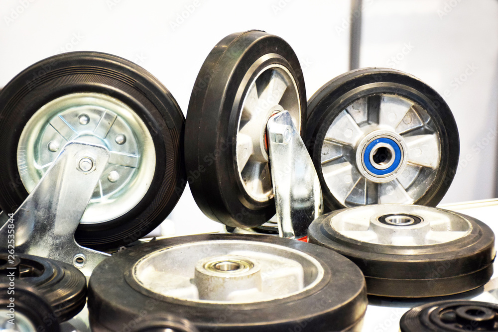 Industrial black urethane on the plastic core wheels. Group of ...