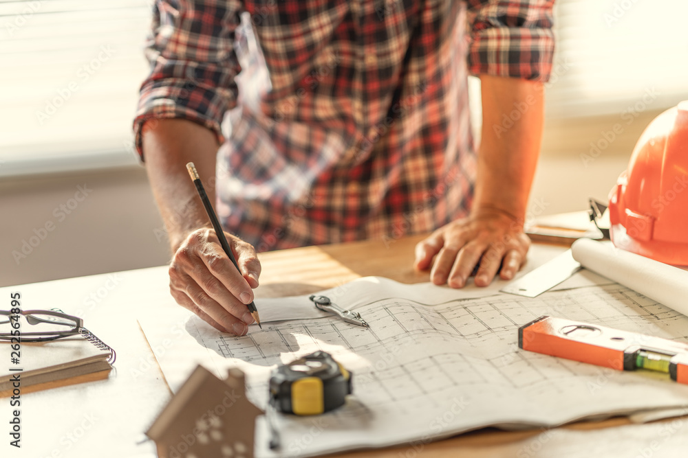 Architect & Engineer working drawing document about project planning ...