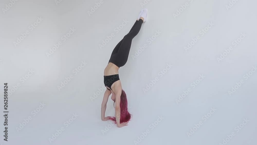 Fitness, stretching workout, attractive mature woman in violet ...