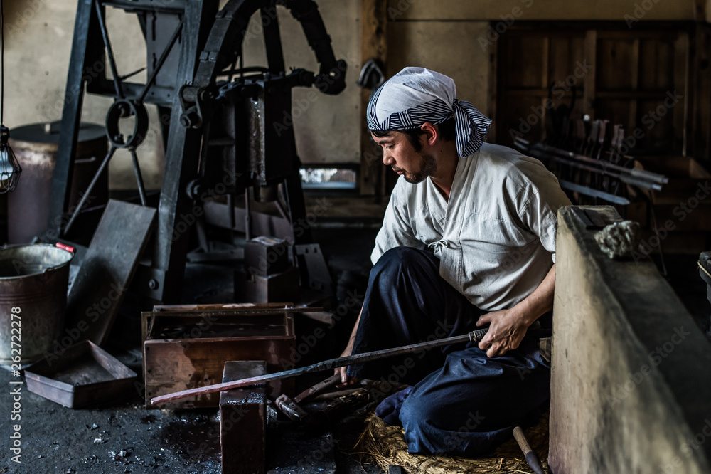 Swordsmith making Japanese swords Stock Photo | Adobe Stock