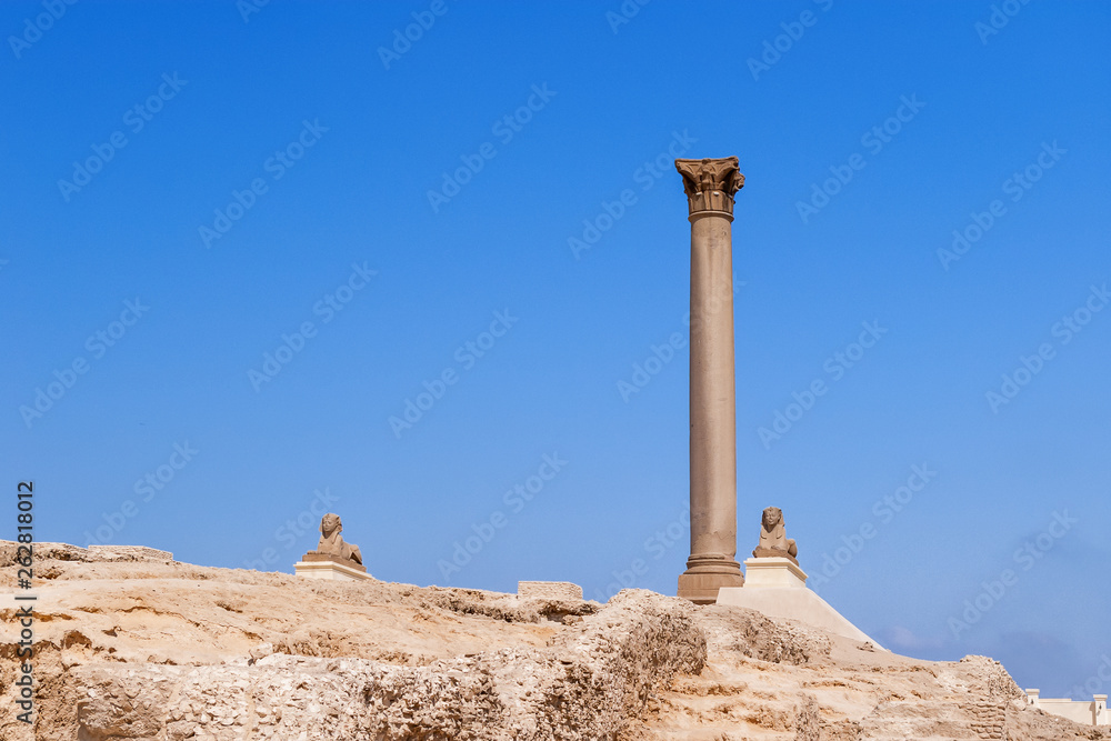 Pompey's Pillar, Roman triumphal column, with two Sphinx statues ...