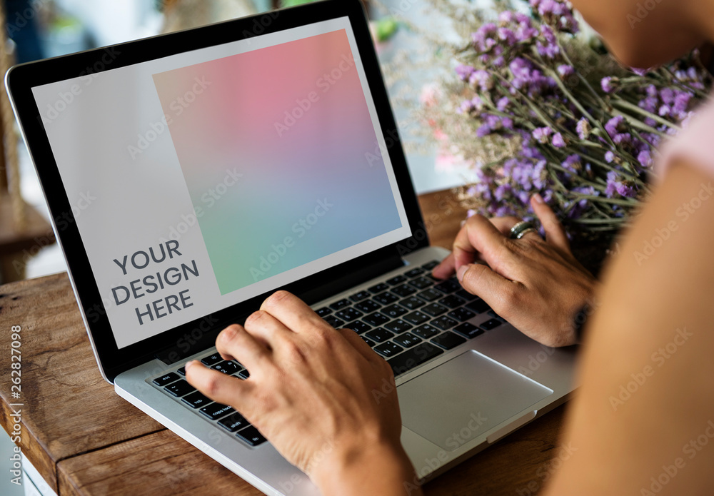 Person Using Laptop Mockup on Wooden Table Stock Template | Adobe Stock