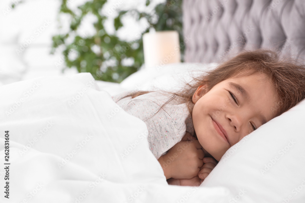 Cute little girl sleeping in cozy bed Stock Photo | Adobe Stock