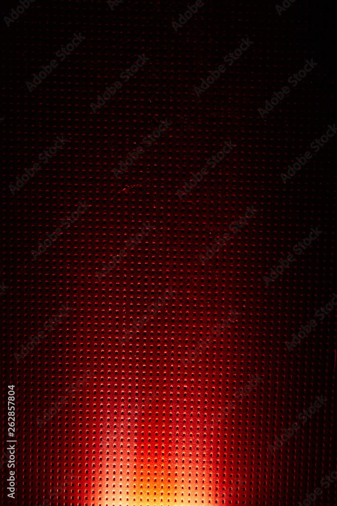 Unusual ray of light on a red background in a black dot Stock Photo ...