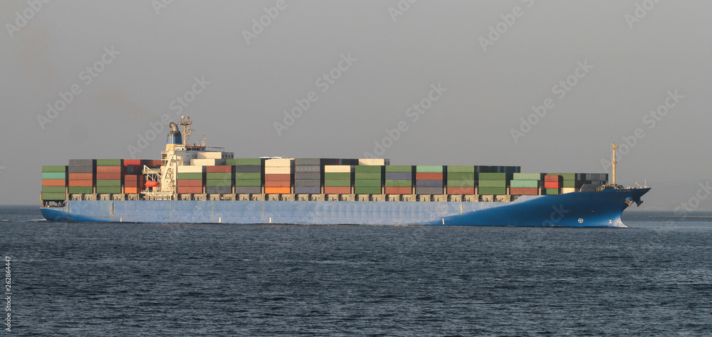 Container ship carrying goods Stock Photo | Adobe Stock