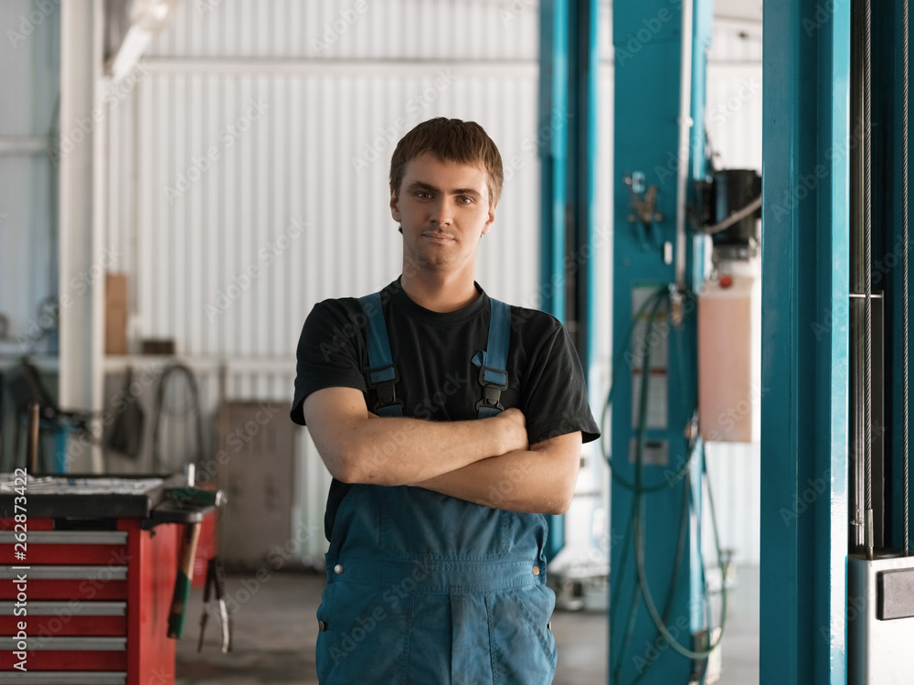 Worker of vehicle service station Stock Photo | Adobe Stock