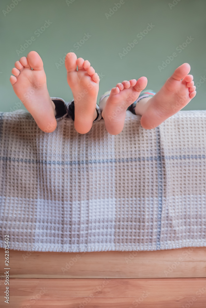 BareFeet of Kids. Toes and heels of two boys. Body part, foot. Children's feet. Barefeet on the ...