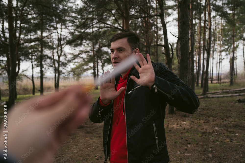 Man refusing to take cigarette. Crop female hand offering cigarette to ...