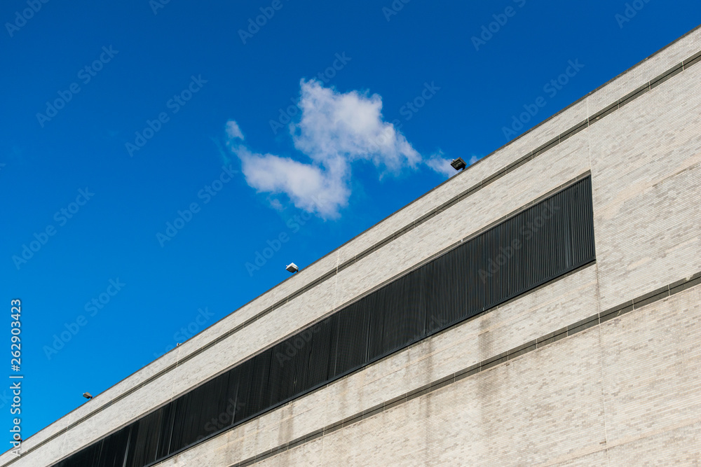 Windowless exterior wall of a tall commercial building in New York City ...