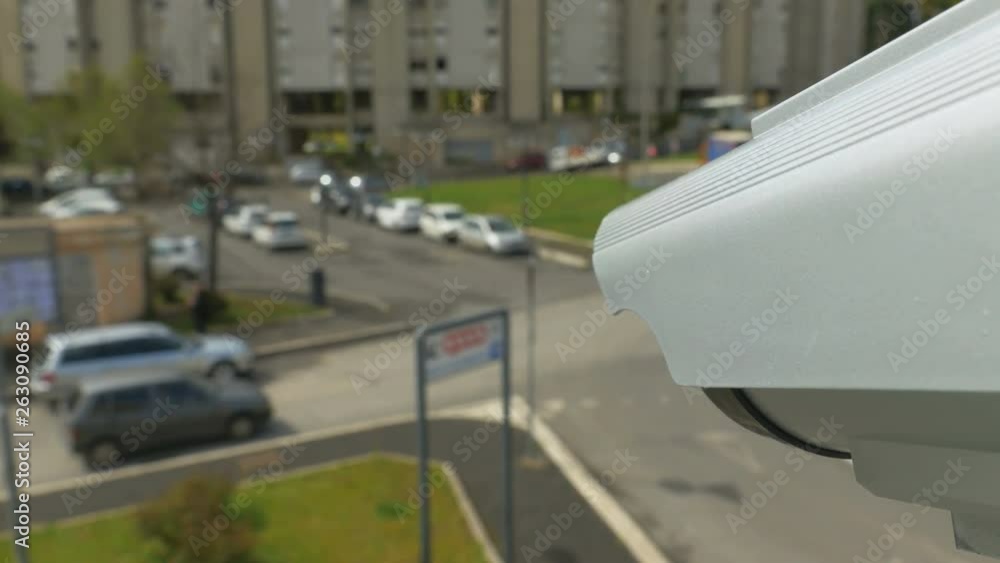 Remotely controlled CCTV camera over street with left-hand traffic ...