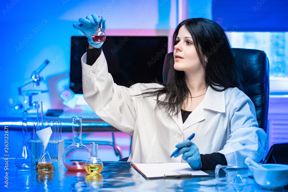 Female Chemist At Work