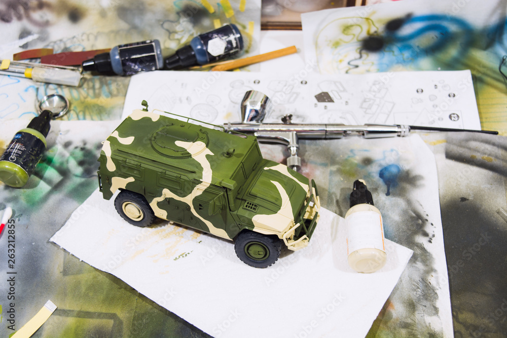 Russian military armored camouflage jeep Tiger. Plastic scale model on ...