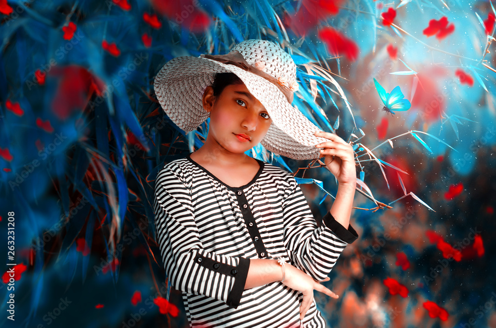 Fashion Model beautiful Girl with big hat outdoor posing for camera ...