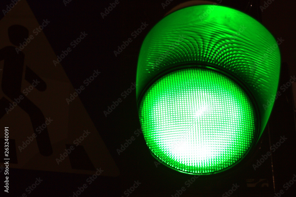Foto de Green light of traffic light on the crossing. Road crossing ...