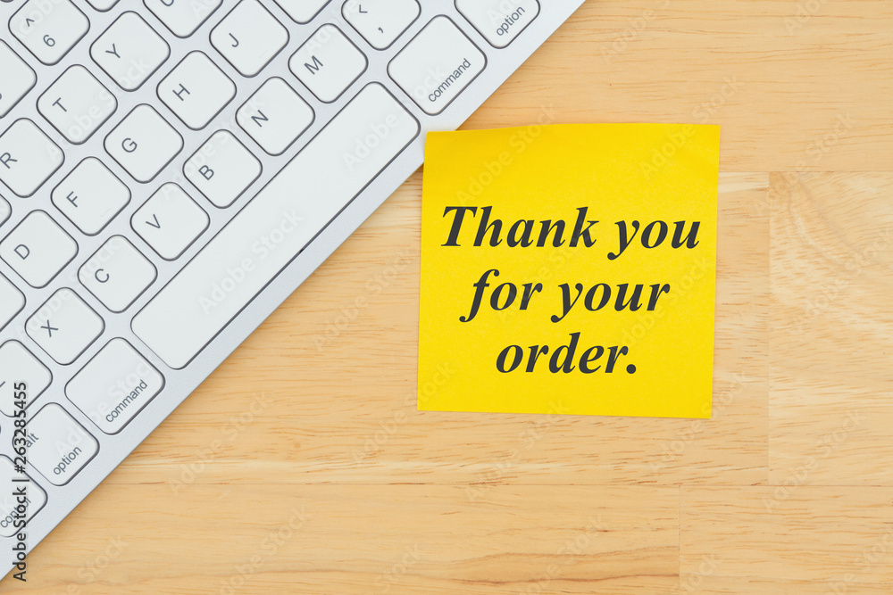 Thank you for your order text on a sticky note with a keyboard Stock ...