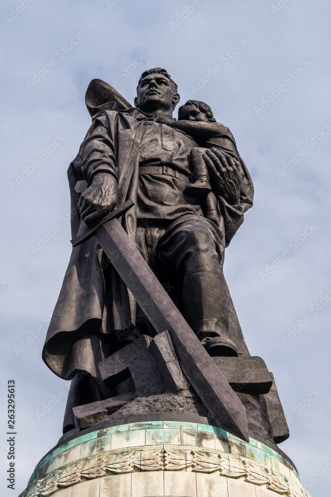 Bronze statue that symbolizes a Russian soldier who protects a child ...