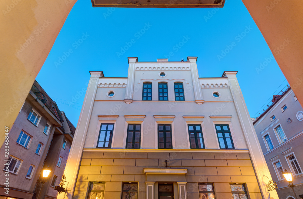 German style residential building. Illuminated facade in the early ...