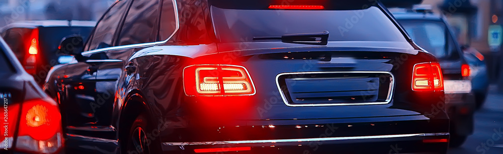 view of car in traffic jam / rear view of the landscape from window in ...